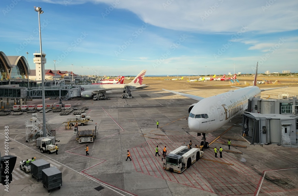 Emirates Boeing 777-300 parked at gate at Mactan-Cebu International ...
