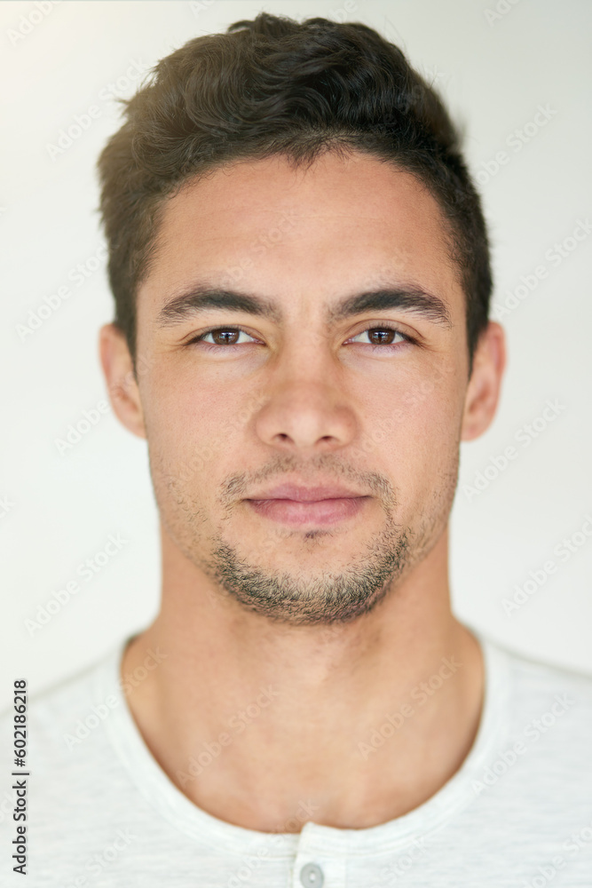 Portrait, face and headshot of man in studio, isolated white background ...