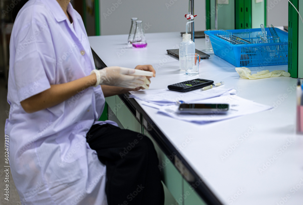 Acid-base reaction titration in Laboratory. Stock Photo | Adobe Stock