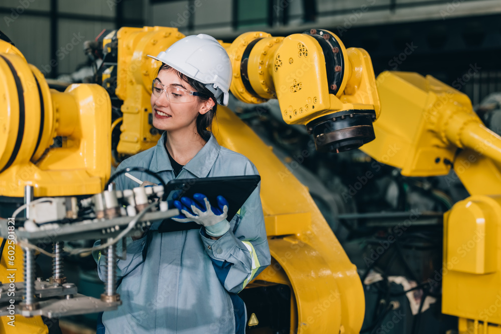 Robotic engineer conduct regular maintenance by inspecting, testing ...