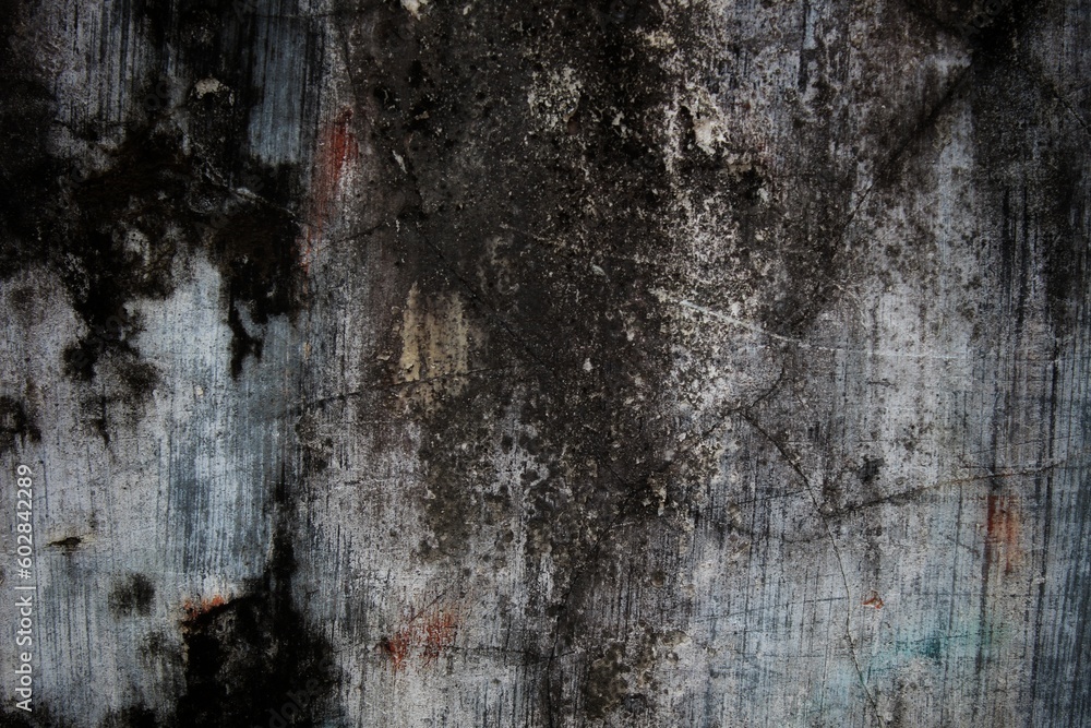 This close-up of a weathered, rundown wall displays the deterioration ...