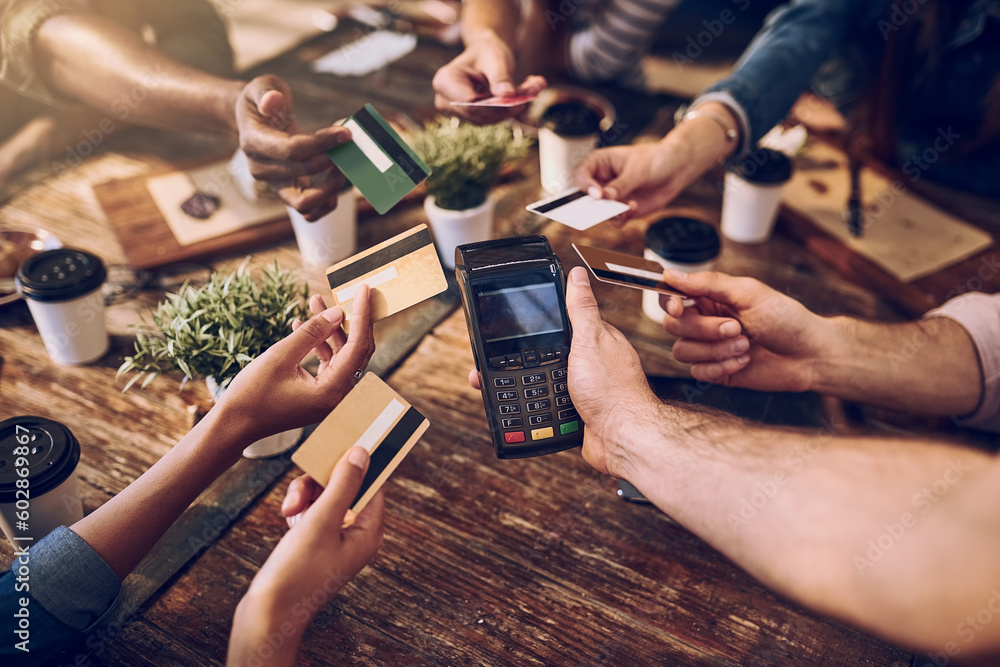 Hands, payment and friends in a cafe, credit card and share bill with ...