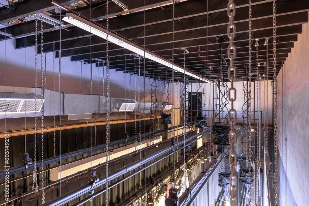 Theater stage rigging with theatrical equipment, lighting, supports ...