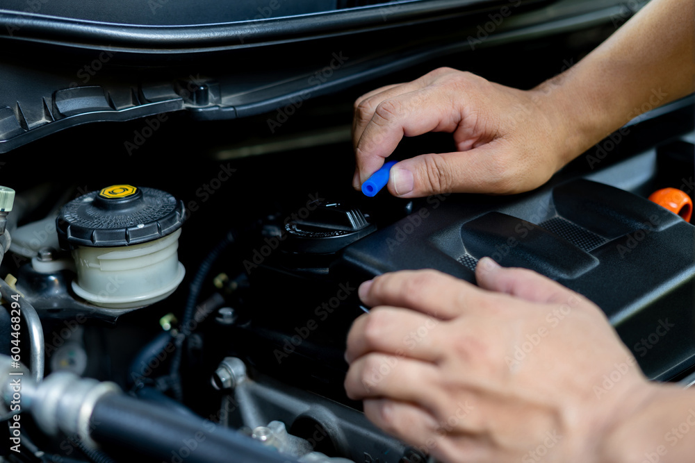 Car service and maintenance concept, Close-up hand serviceman hold ...