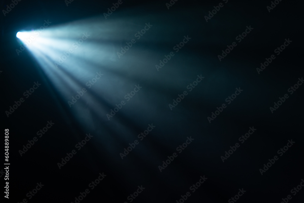 blue spotlight light beam on black background Stock Photo | Adobe Stock