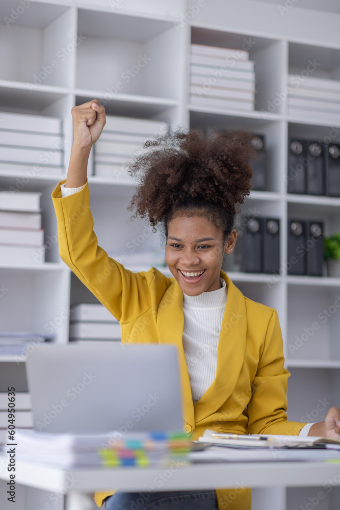Excited african american woman sit at desk feel euphoric win online ...