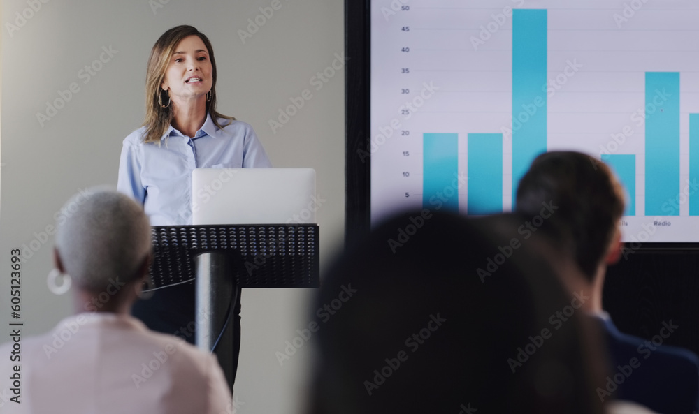Woman speaker, conference and business graphs at a seminar, workshop or ...
