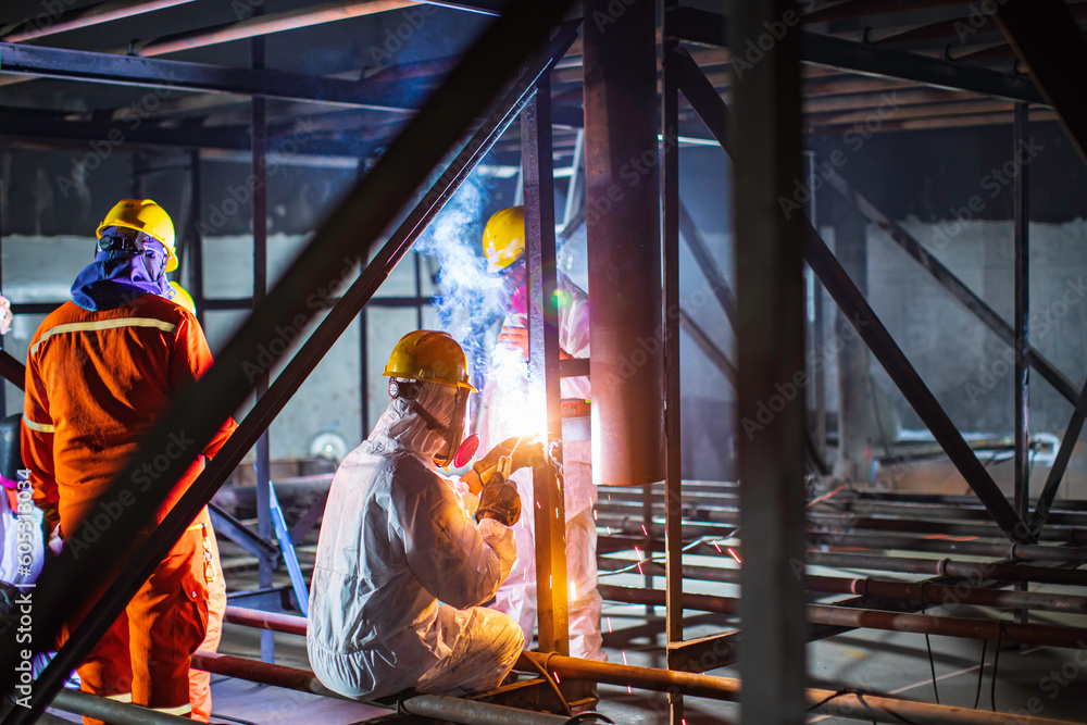 Welding male worker metal is part of machinery plate tank beam pipe ...
