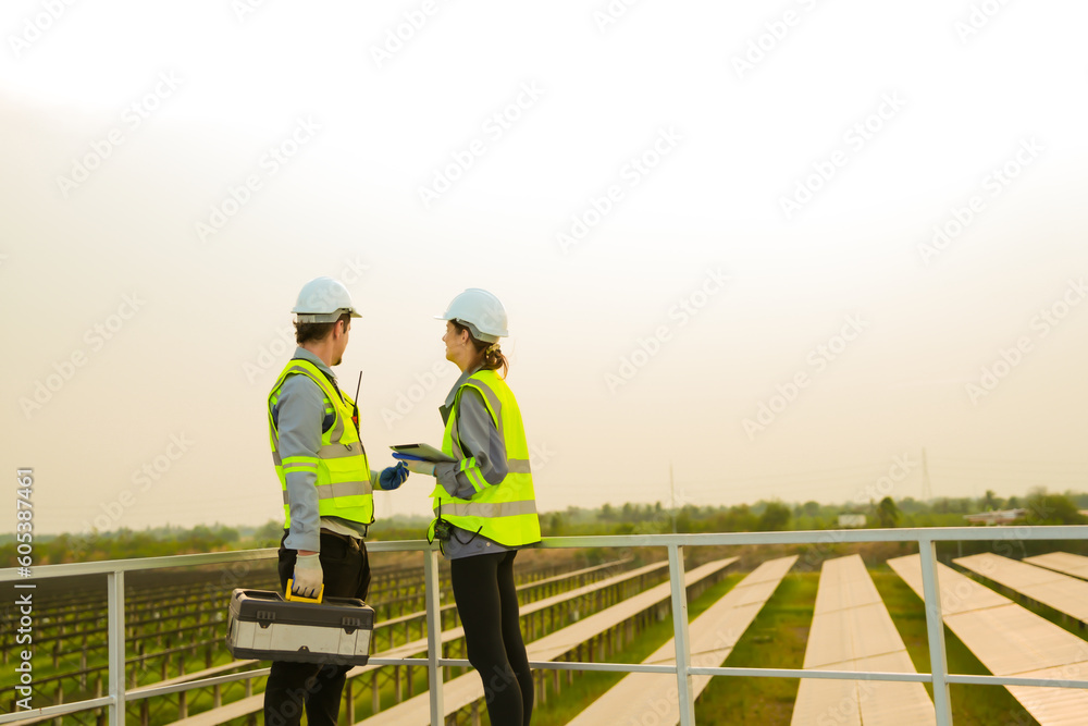 Engineers inspecting construction of solar panel at roof top. solar ...