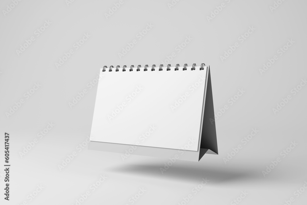 White monthly desktop calendar floating in mid air casting shadow on ...
