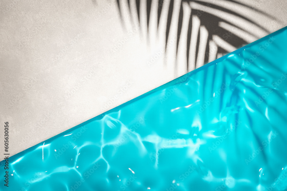 Luxury swimming pool and palm shadow in water top view. Summer tropical ...