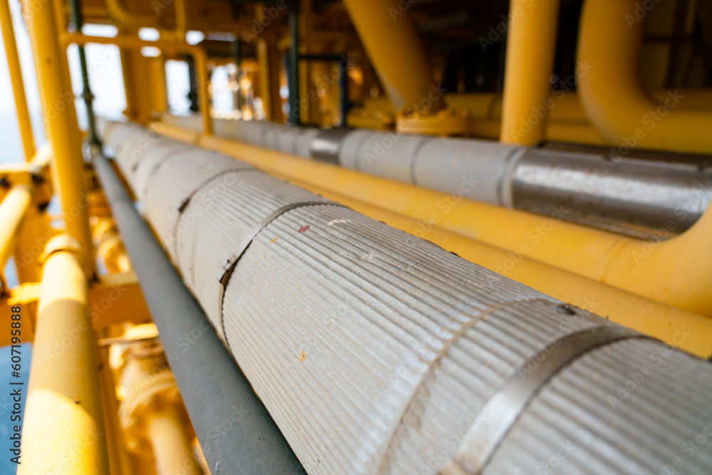 Heating medium oil pipeline protected with stainless steel insulation ...