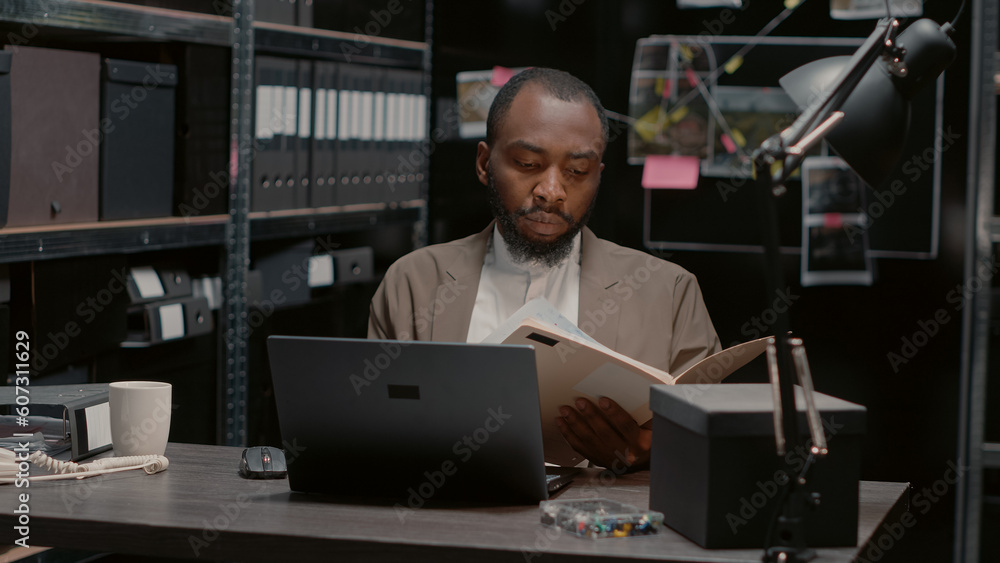 Professional inspector studying crime scene clues, examining ...