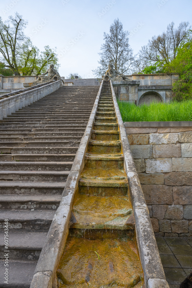 Historical baroque staircase with water cascades on each side and ...