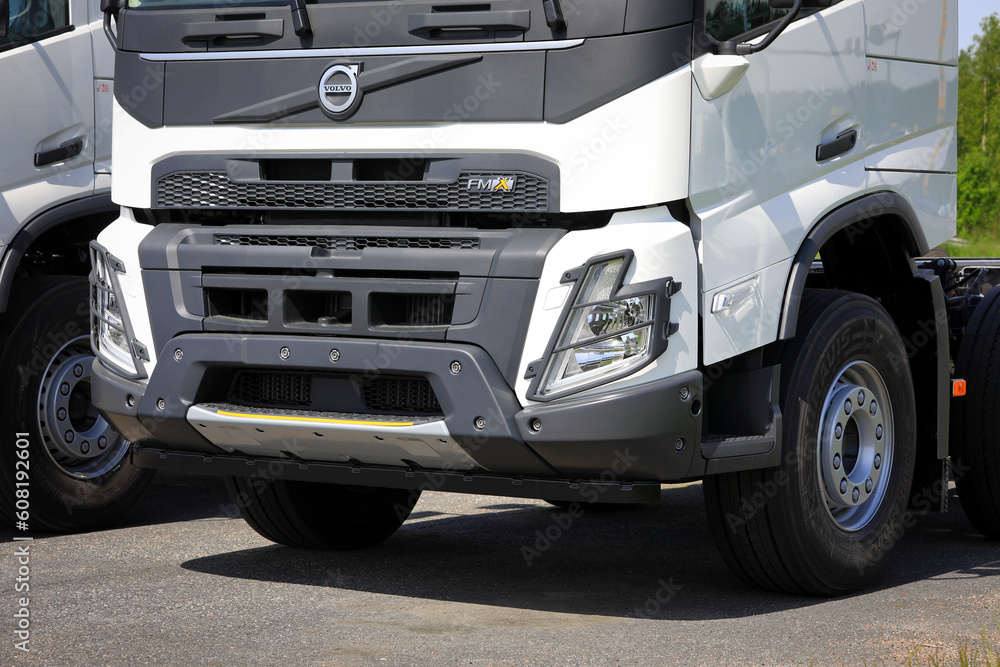 New, White Volvo FMX Construction Truck Parked. Detail of truck front ...