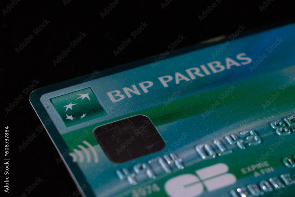 Foto de Stock PARIS, FRANCE - APRIL 13, 2023: BNP Paribas logo on one ...