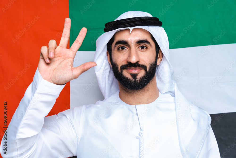 Handsome arab middle-eastern man with traditional kandora portrait in ...