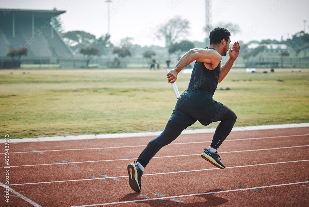 Stadium, man relay running and athlete on a runner and arena track for ...