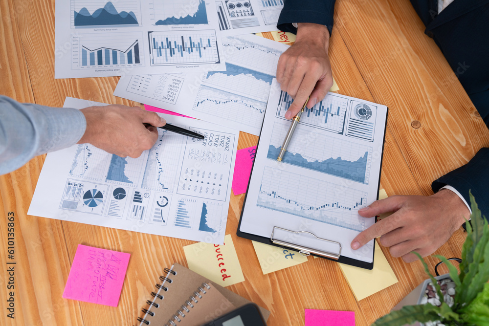 Analyst team in office analyzing financial data analysis for marketing ...