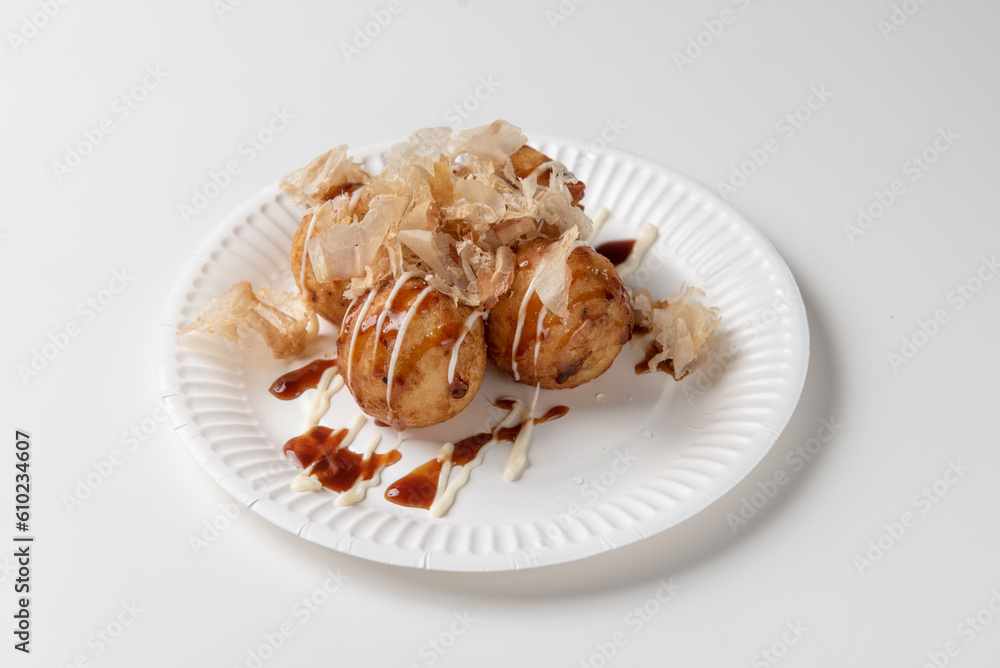 Takoyaki Chinese octopus balls , garnished with cheese sauce, soy sauce ...