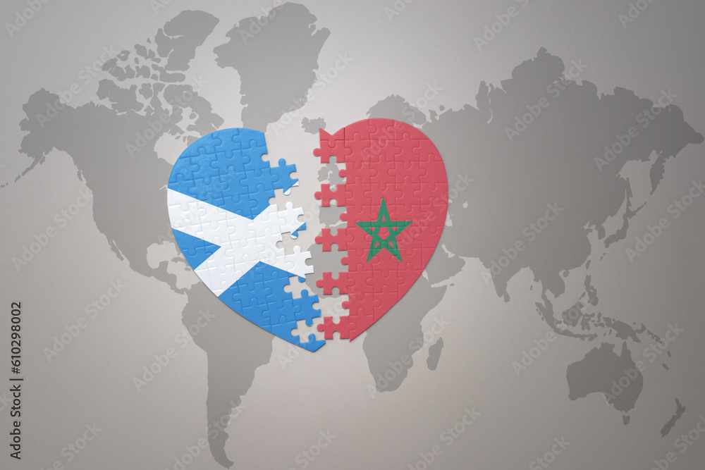 puzzle heart with the national flag of morocco and scotland on a world ...