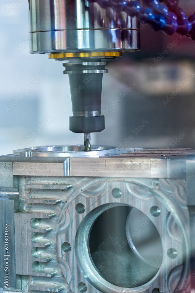 Foto Demonstration of the work of a CNC milling machine drilling a ...
