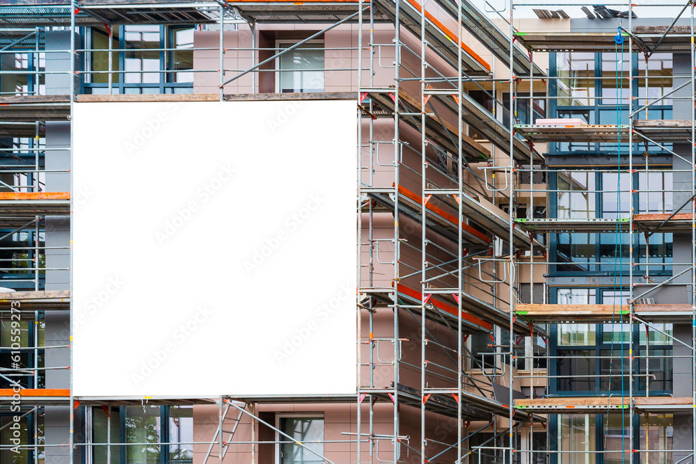 Advertisement billboard on scaffolding,signboard on building facade ...