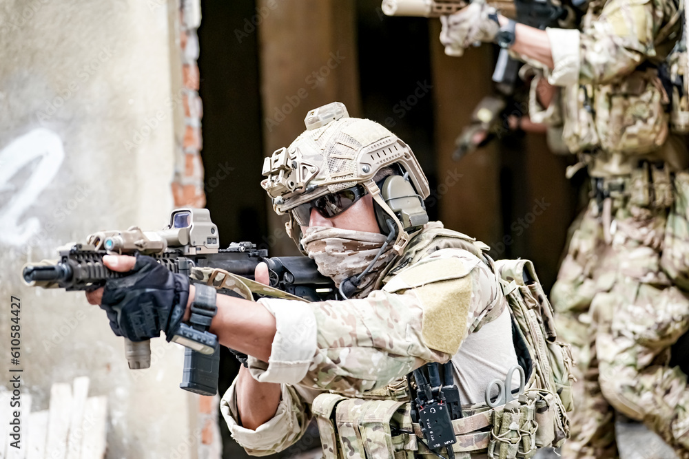 Infantry soldier shooting during military combat training.. Army elite ...