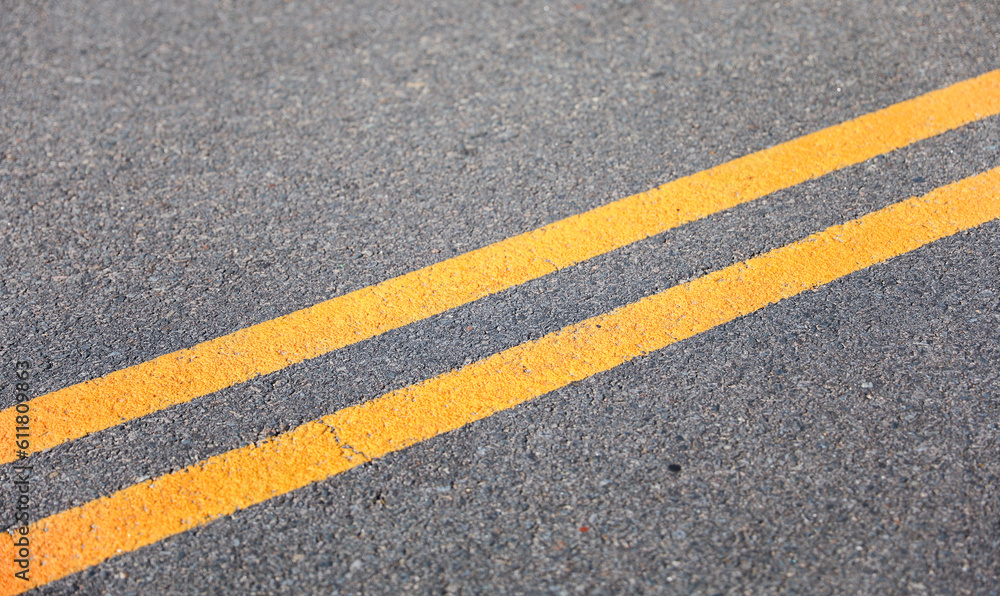 Double yellow line streets symbolize traffic regulation, no passing ...