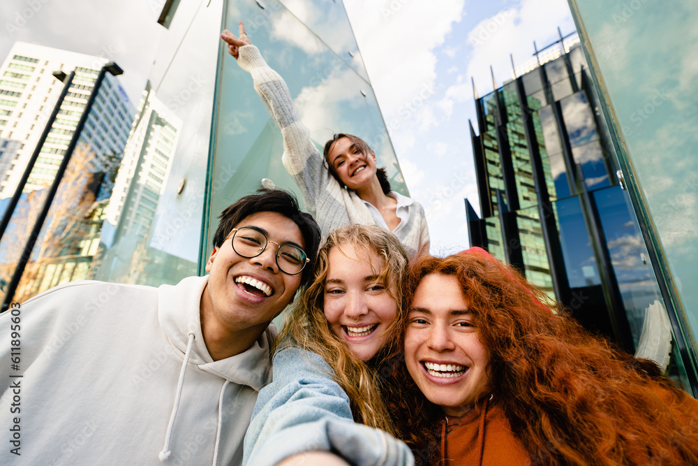 Group of happy young Gen Z friends taking self portrait for social ...