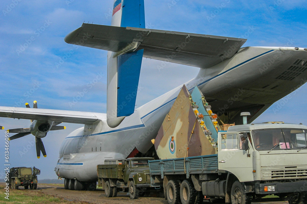 An-22 (NATO: rooster) Aircraft Antey. Unloading MiG-29 (Fulcrum) from ...