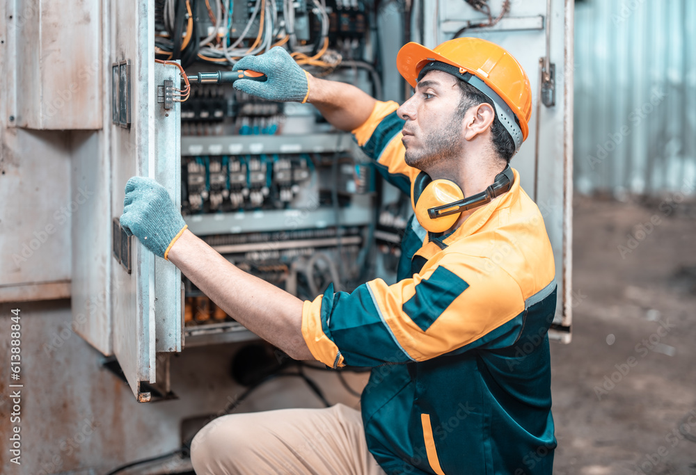 Electrical technician tests wiring, polarity, grounding, voltages and ...