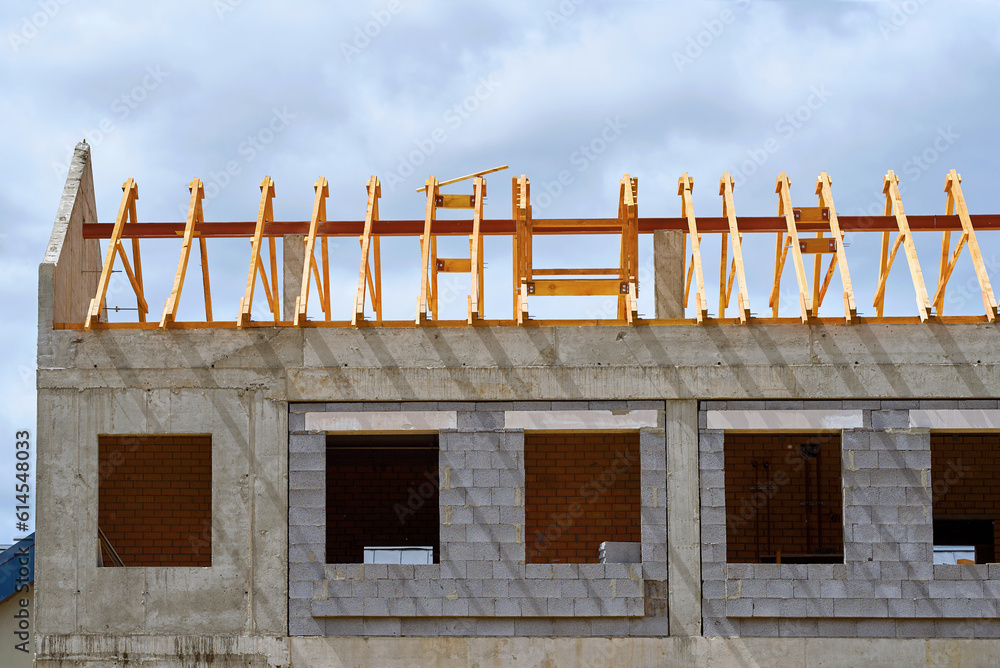 Construction of wooden frame of roof. Building construction, roof ...