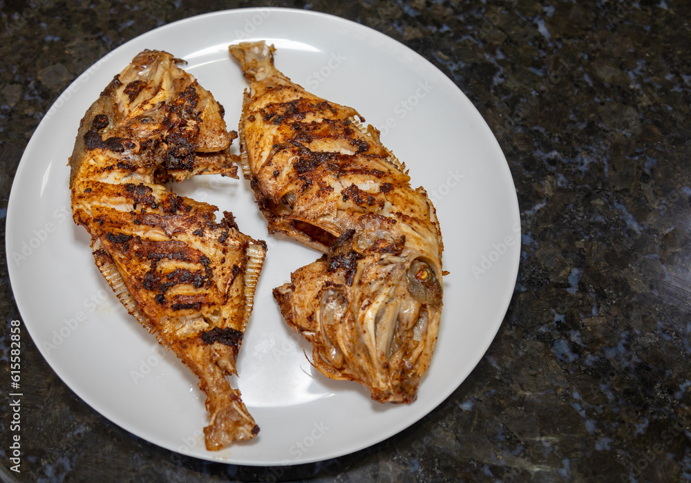 Clean and seasoned Peroá fish (Balistes capriscus) . Typical fish from ...