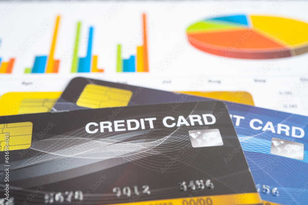 Credit card model on chart and graph spreadsheet paper. Finance ...