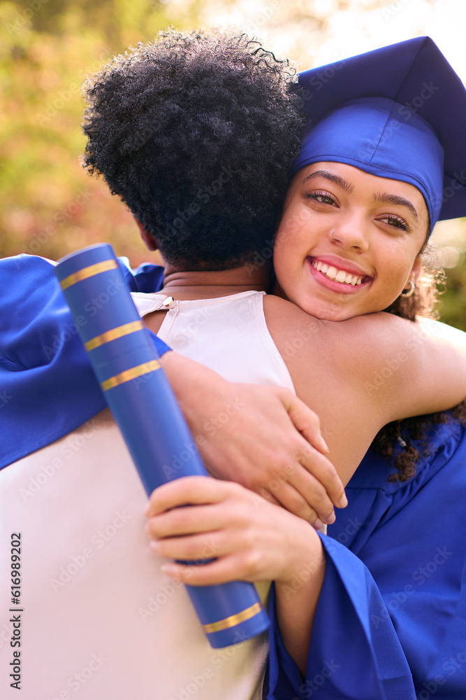 Proud Mother Celebrating And Hugging Teenage Daughter Wearing ...