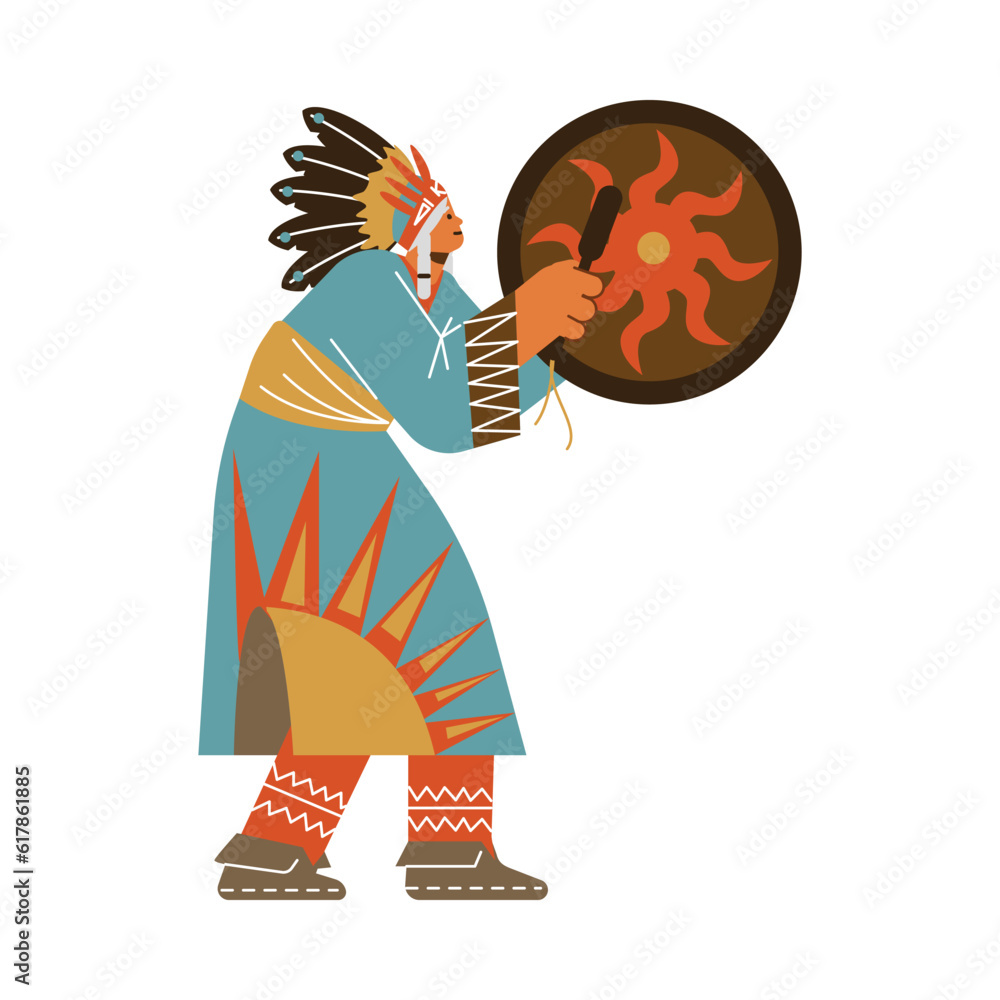 Native American Indian tribal shaman beats the drum in traditional ...