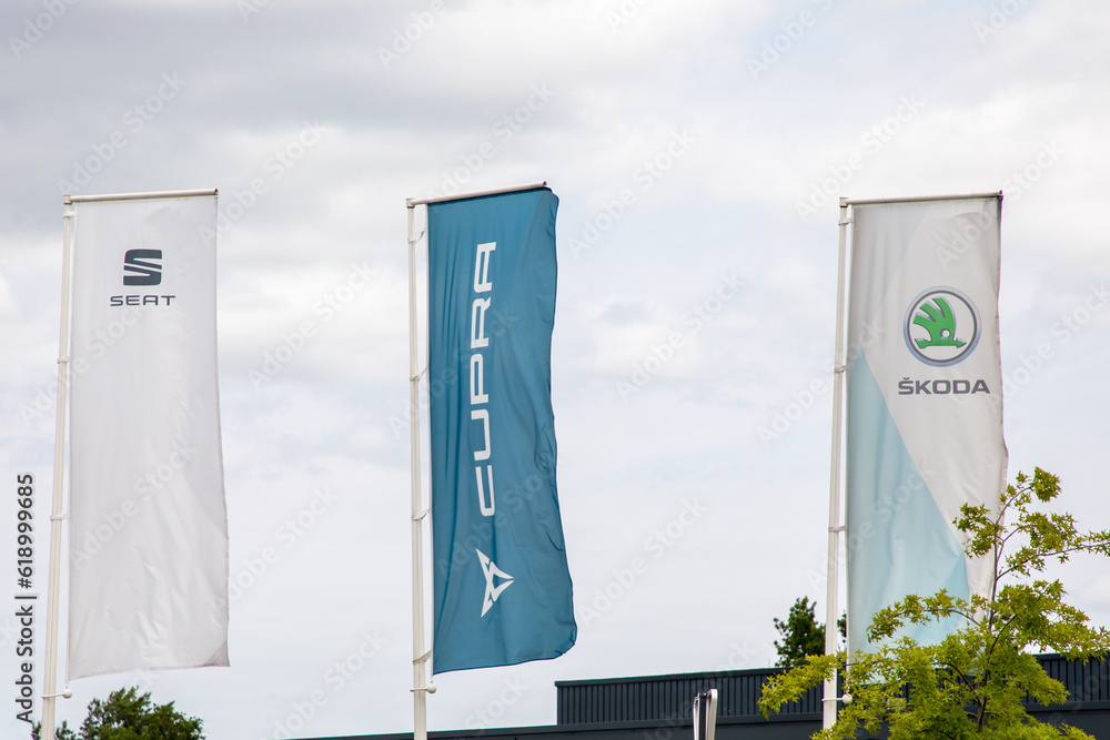 seat cupra and Skoda flags of dealership sign store logo text and brand ...