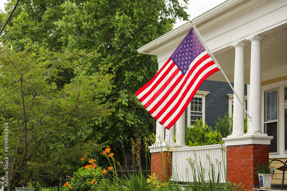 US flag waves proudly on July 4th, symbolizing patriotism and honoring ...