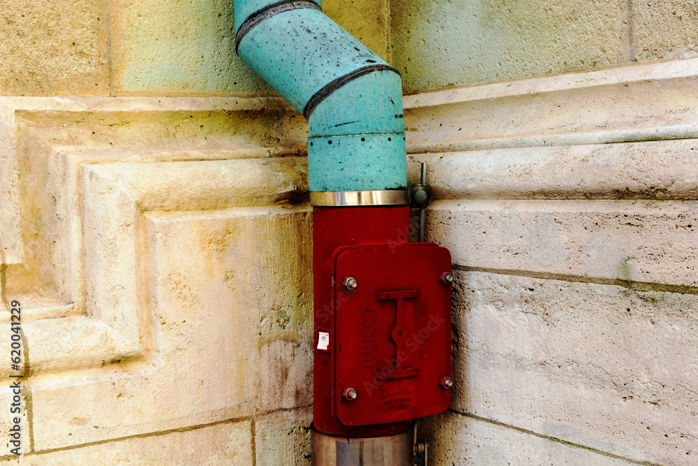 cast iron painted cleanout plate accessory on copper vertical downspout ...