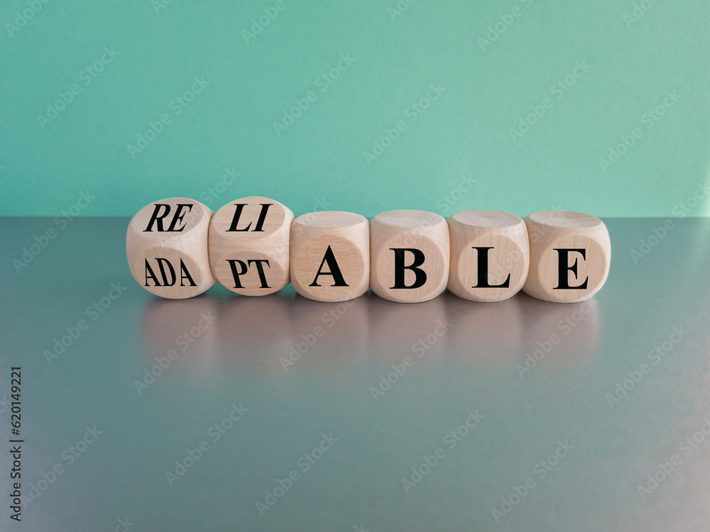 Adaptable or reliable symbol. Turned wooden cubes and changed the word ...