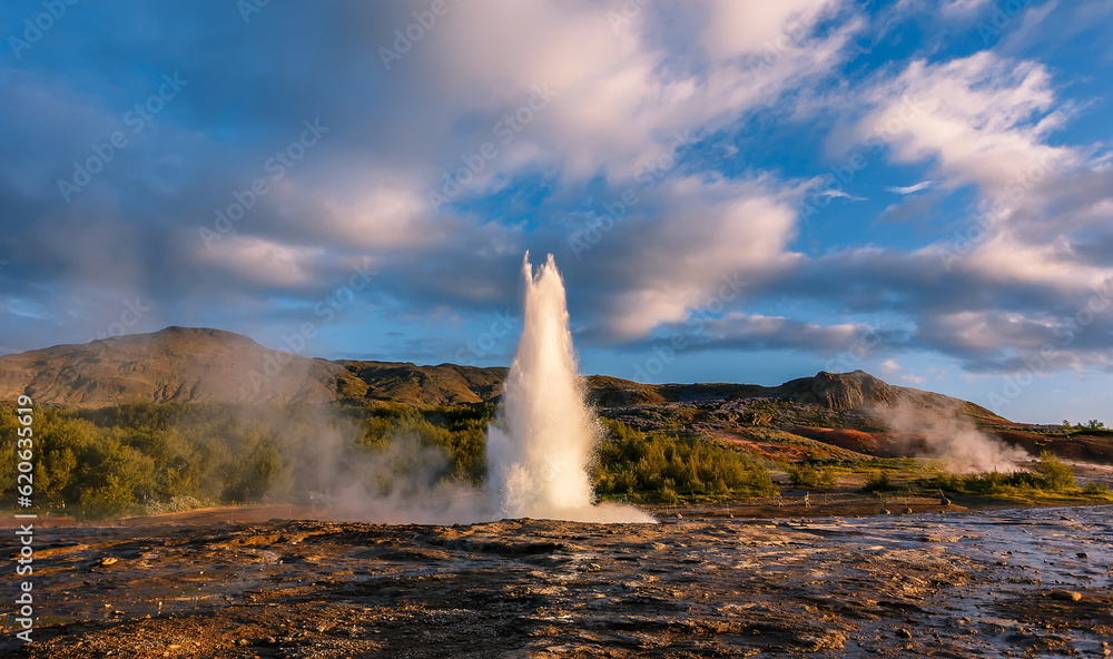 Stunning Eruption of Strokkur Geysir in Iceland during sunset. Strokkur Geyser Popular touristic ...