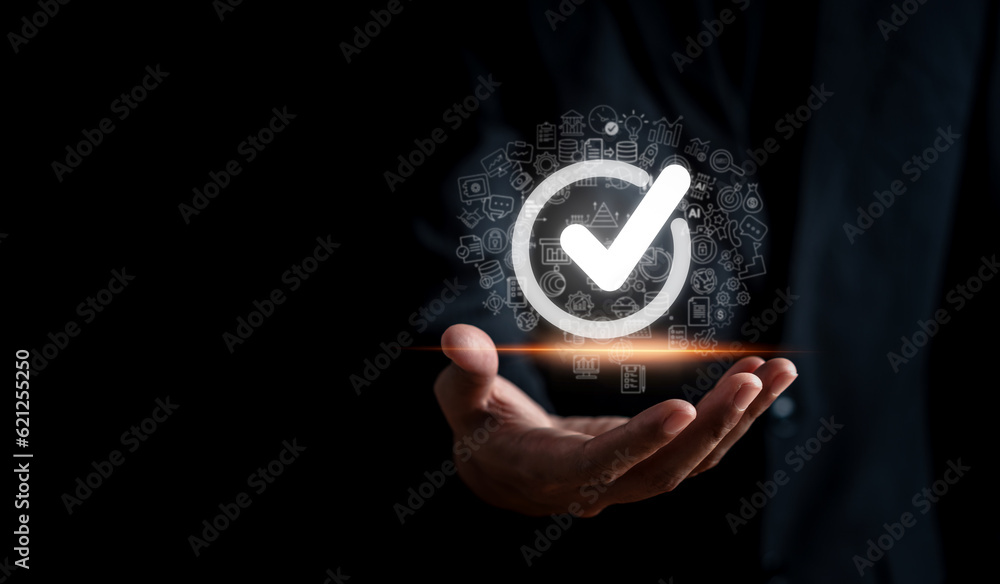 Hand man holding tick or check mark correct sign for quality standards ...