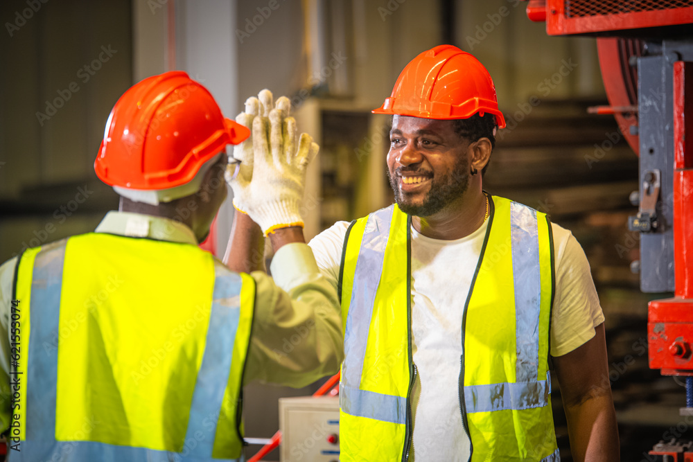 Teamwork African American worker in the factory. Black man afro work ...