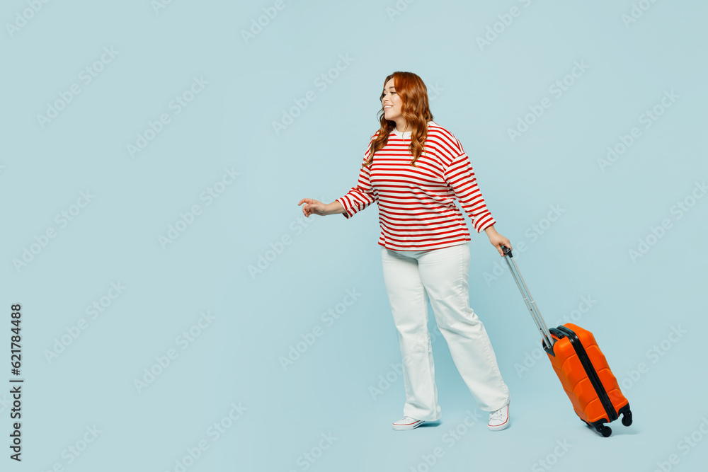 Traveler chubby overweight woman wears casual clothes hold bag walk go ...