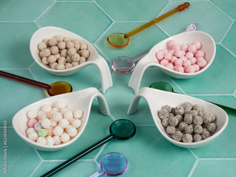 Raw, uncooked tapioca balls with different flavors, also known as boba ...