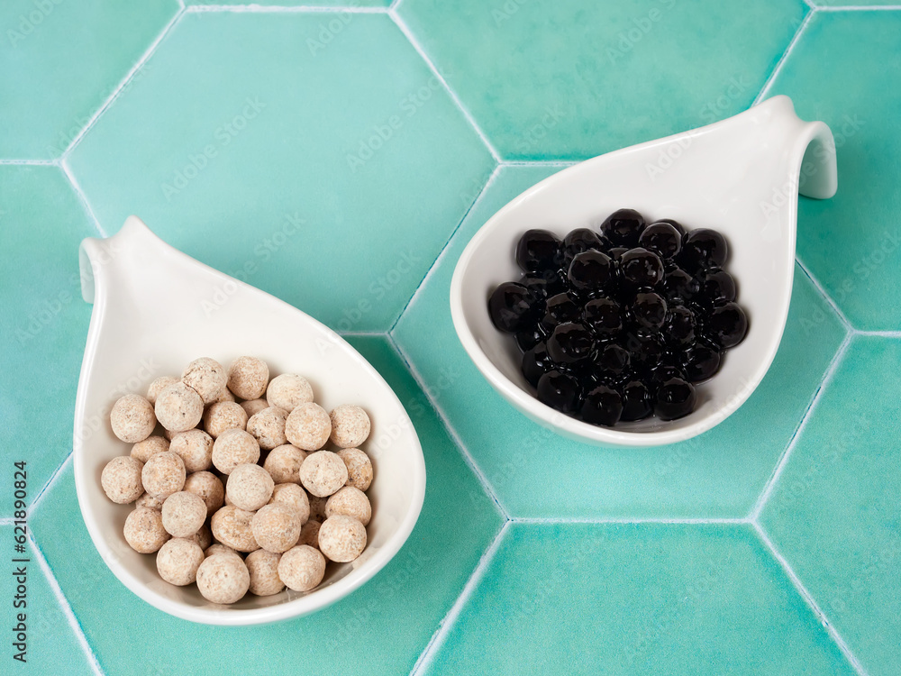 Raw and cooked tapioca balls with different flavors, also known as boba ...