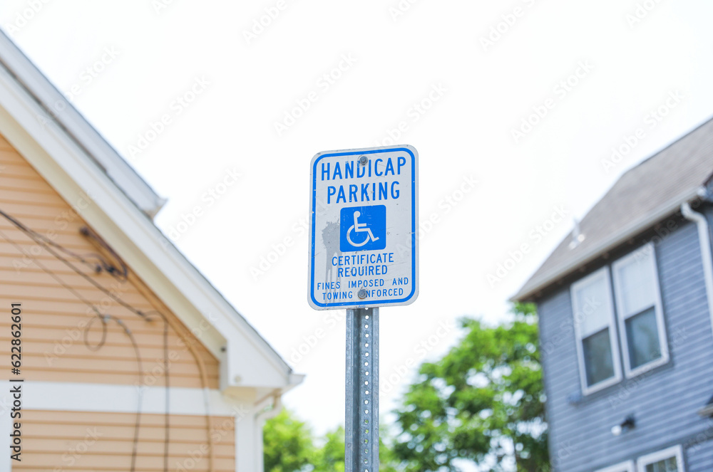 blue wheelchair symbol on a white background. The handicap sign ...
