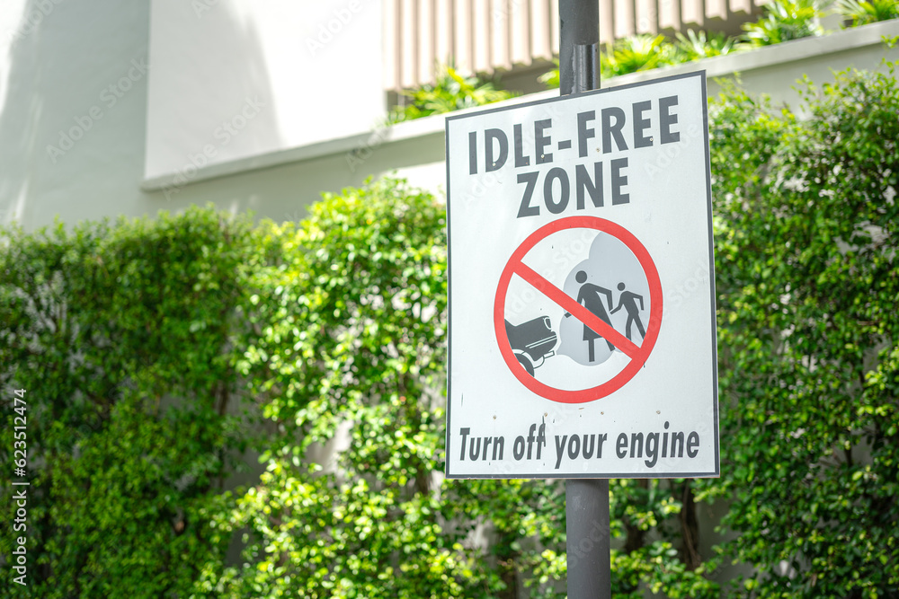 "Idle-Free zone" symbol banner at public vehicle parking lot, the ...