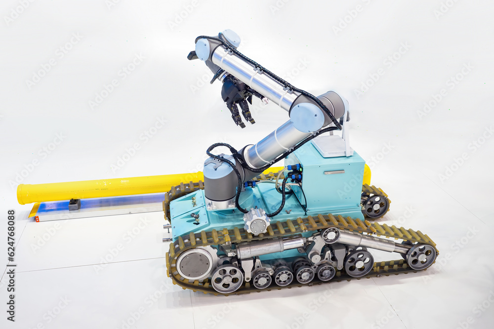 Mobile robotic complex. Robot with manipulator. Tracked radio ...